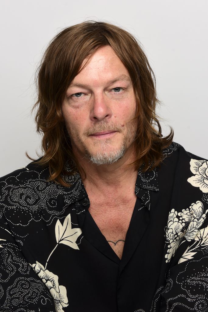 Emily Kinney En Norman Reedus Kussen Elkaar